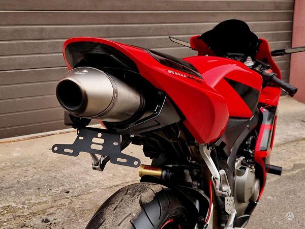 Red Honda Cbr 2004 in Vilnius, with an engine capacity of 0.60 L and mileage of 43 thousand km for 3650 €, photo 9 on AUTOMOTO.COM.LV