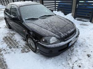Black Honda Civic 1998 in Riga, with an engine capacity of 1.60 L and mileage of 195 thousand km for 6999 €, photo  on AUTOMOTO.COM.LV