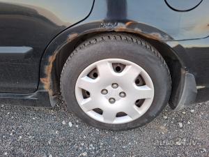 Black Honda Civic 2004 in Tallinn, with an engine capacity of 1.60 L and mileage of 184 thousand km for 500 €, photo 8 on AUTOMOTO.COM.LV
