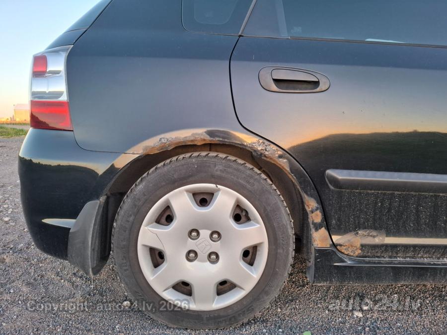 Black Honda Civic 2004 in Tallinn, with an engine capacity of 1.60 L and mileage of 184 thousand km for 500 €, photo 9 on AUTOMOTO.COM.LV