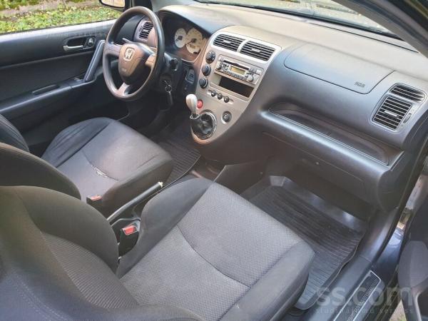 Black Honda Civic 2005 in Riga, with an engine capacity of 1.60 L and mileage of 287 thousand km for 850 €, photo 7 on AUTOMOTO.COM.LV