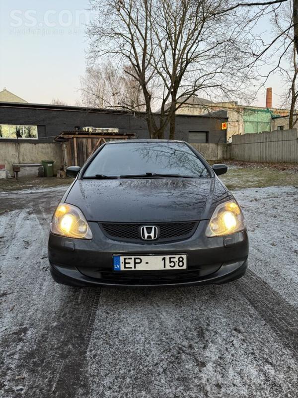 Black Honda Civic 2006 in Riga, with an engine capacity of 1.60 L and mileage of 174 thousand km for 1100 €, photo 1 on AUTOMOTO.COM.LV