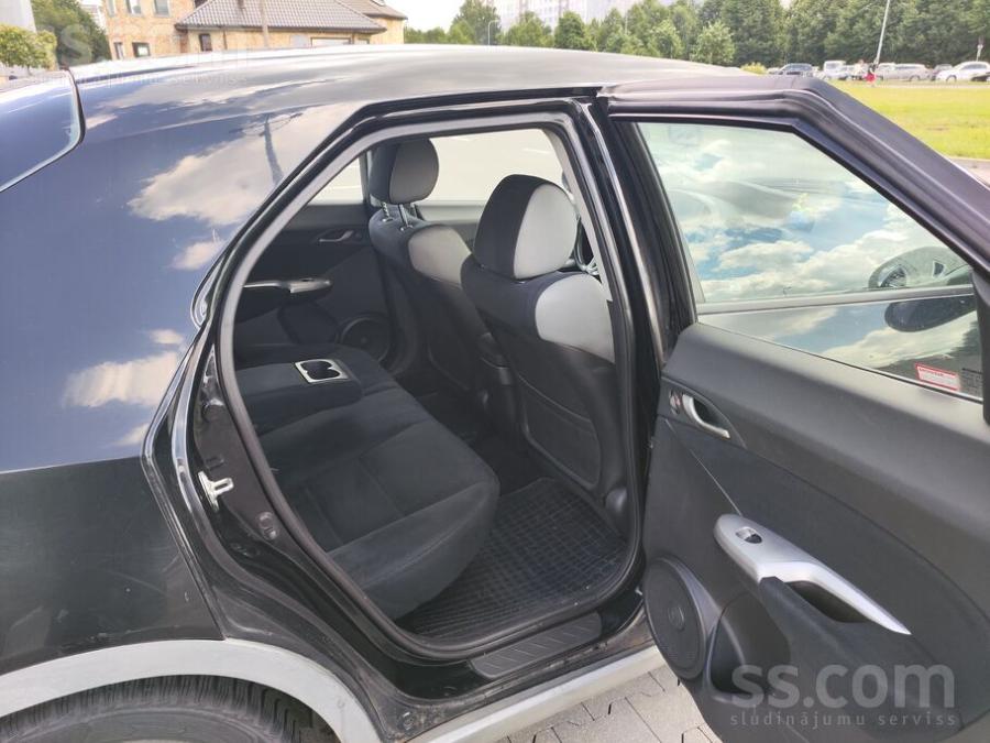 Black Honda Civic 2006 in Riga, with an engine capacity of 1.40 L and mileage of 254 thousand km for 2500 €, photo 13 on AUTOMOTO.COM.LV