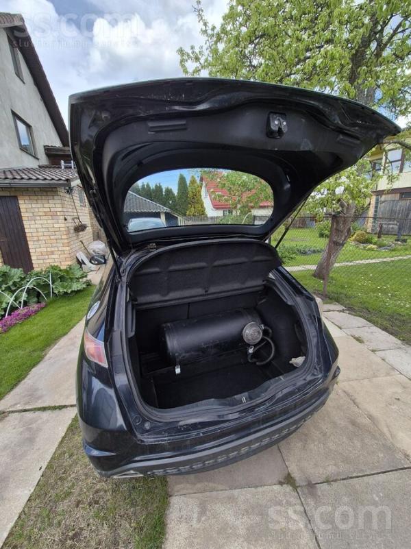 Black Honda Civic 2007 in Riga, with an engine capacity of 1.80 L and mileage of 251 thousand km for 1650 €, photo 5 on AUTOMOTO.COM.LV