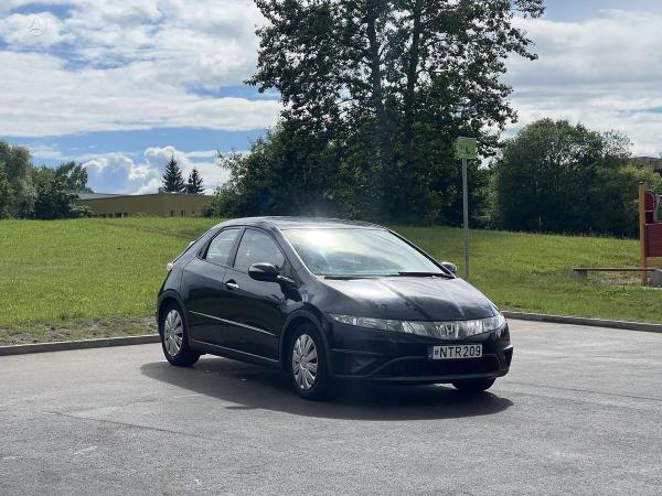 Black Honda Civic 2007 in Vilnius, with an engine capacity of 1.34 L and mileage of 236 thousand km for 2000 €, photo 1 on AUTOMOTO.COM.LV