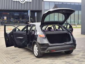 Black Honda Civic 2010 in Siauliai, with an engine capacity of 1.80 L and mileage of 209 thousand km for 4650 €, photo 12 on AUTOMOTO.COM.LV