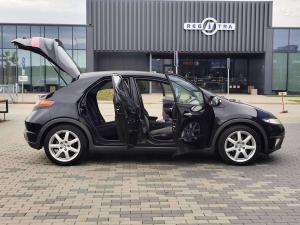 Black Honda Civic 2010 in Siauliai, with an engine capacity of 1.80 L and mileage of 209 thousand km for 4650 €, photo 17 on AUTOMOTO.COM.LV