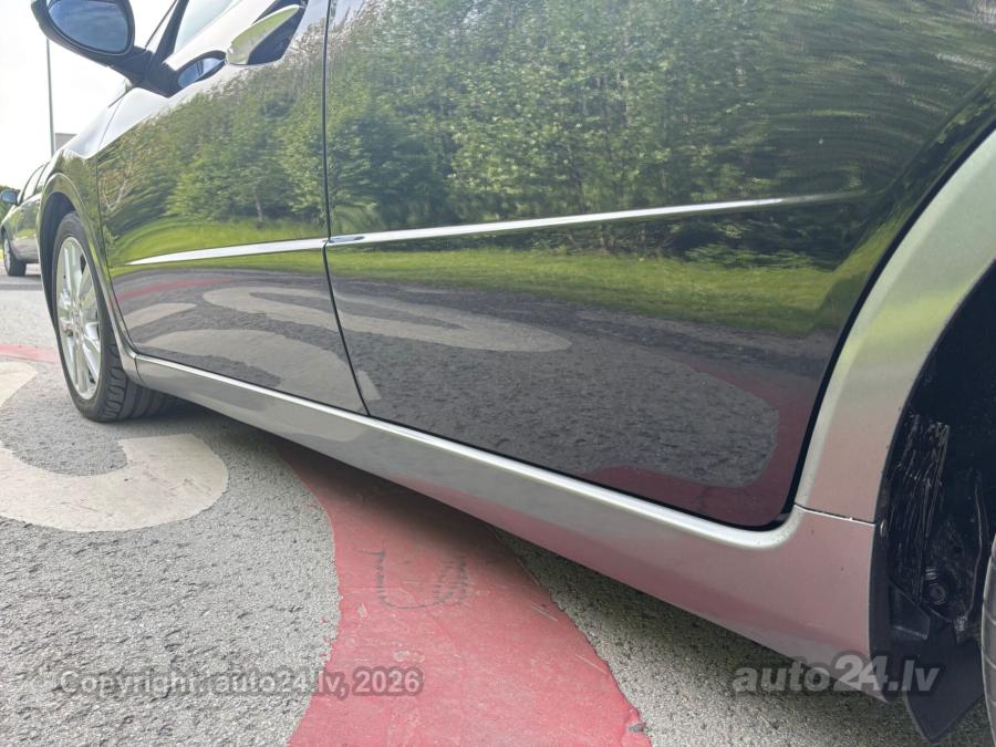 Melns Honda Civic 2011 Tallina, ar dzinēja tilpumu 1.80 L un nobraukumu 160 tūkst. km par 5490 €, foto 28 vietnē AUTOMOTO.COM.LV