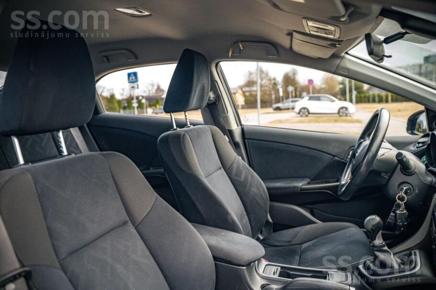 Black Honda Civic 2012 in Riga, with an engine capacity of 2.20 L and mileage of 0 thousand km for 4990 €, photo 11 on AUTOMOTO.COM.LV