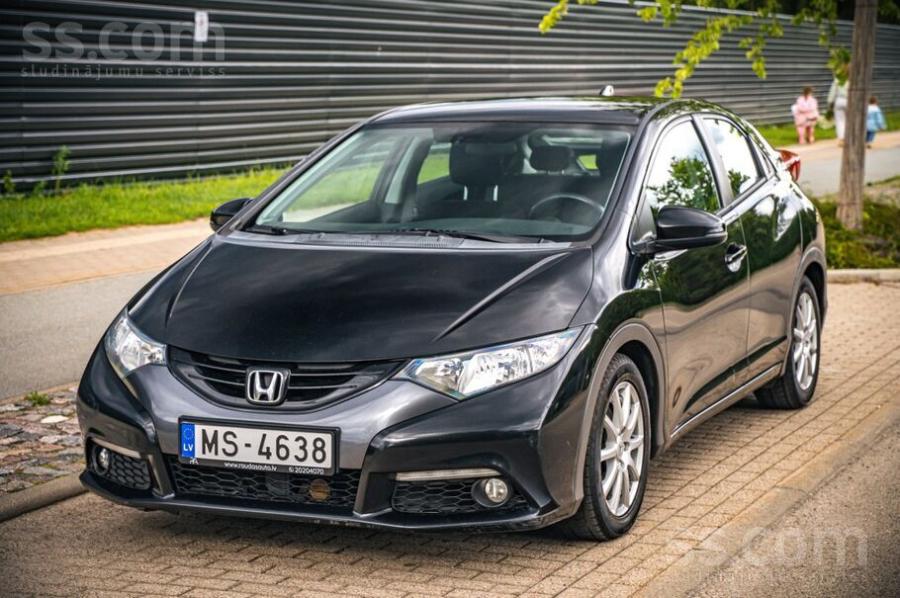 Black Honda Civic 2012 in Riga, with an engine capacity of 2.20 L and mileage of 298 thousand km for 4990 €, photo 1 on AUTOMOTO.COM.LV