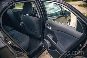 Black Honda Civic 2012 in Riga, with an engine capacity of 2.20 L and mileage of 298 thousand km for 4990 €, photo 11 on AUTOMOTO.COM.LV