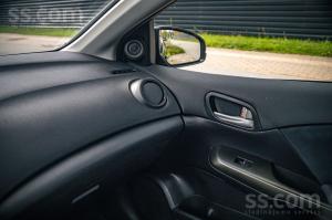 Black Honda Civic 2012 in Riga, with an engine capacity of 2.20 L and mileage of 298 thousand km for 4990 €, photo 17 on AUTOMOTO.COM.LV