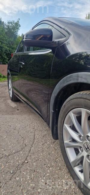 Melns Honda Civic 2015 Rīga, ar dzinēja tilpumu 1.40 L un nobraukumu 172 tūkst. km par 6500 €, foto 11 vietnē AUTOMOTO.COM.LV