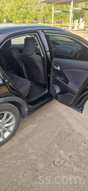 Melns Honda Civic 2015 Rīga, ar dzinēja tilpumu 1.40 L un nobraukumu 172 tūkst. km par 6500 €, foto 17 vietnē AUTOMOTO.COM.LV