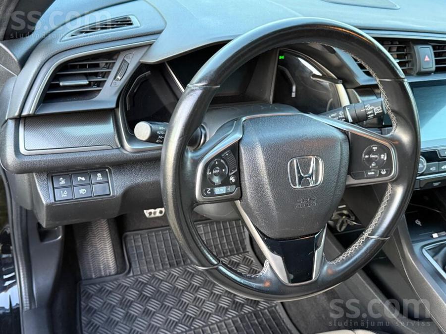 Black Honda Civic 2018 in Riga, with an engine capacity of 1.60 L and mileage of 223 thousand km for 12450 €, photo 21 on AUTOMOTO.COM.LV