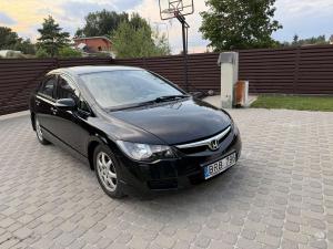 Melns Honda Civic 2006 Vievis, ar dzinēja tilpumu 1.80 L un nobraukumu 280 tūkst. km par 2350 €, foto  vietnē AUTOMOTO.COM.LV