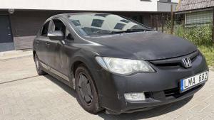 Black Honda Civic 2007 in Vilnius, with an engine capacity of 1.34 L and mileage of 251 thousand km for 1500 €, photo 3 on AUTOMOTO.COM.LV