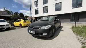 Black Honda Civic 2007 in Vilnius, with an engine capacity of 1.34 L and mileage of 251 thousand km for 1500 €, photo 7 on AUTOMOTO.COM.LV