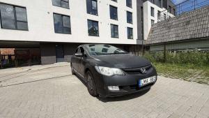 Black Honda Civic 2007 in Vilnius, with an engine capacity of 1.34 L and mileage of 251 thousand km for 1500 €, photo 8 on AUTOMOTO.COM.LV
