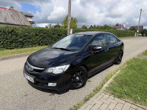 Black Honda Civic 2008 in Vilnius, with an engine capacity of 1.30 L and mileage of 220 thousand km for 1850 €, photo 1 on AUTOMOTO.COM.LV