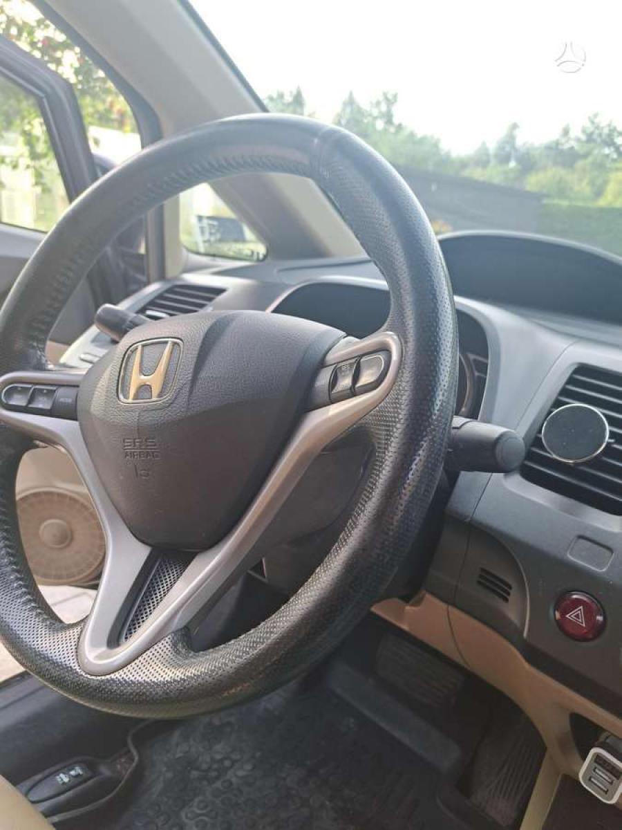 Melns Honda Civic 2008 Panevēža, ar dzinēja tilpumu 1.34 L un nobraukumu 261 tūkst. km par 2200 €, foto 16 vietnē AUTOMOTO.COM.LV