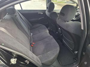 Black Honda Civic 2009 in Ukmerge, with an engine capacity of 1.30 L and mileage of 219 thousand km for 3250 €, photo 14 on AUTOMOTO.COM.LV