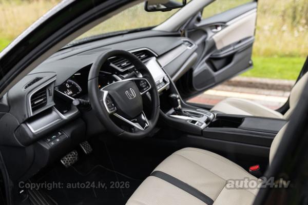 Black Honda Civic 2019 in Tallinn, with an engine capacity of 1.50 L and mileage of 216 thousand km for 11990 €, photo 11 on AUTOMOTO.COM.LV