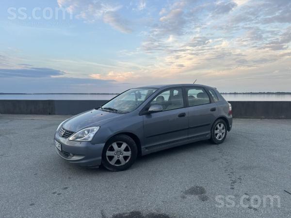 Blue Honda Civic 2005 in Riga, with an engine capacity of 1.60 L and mileage of 265 thousand km for 1200 €, photo 2 on AUTOMOTO.COM.LV