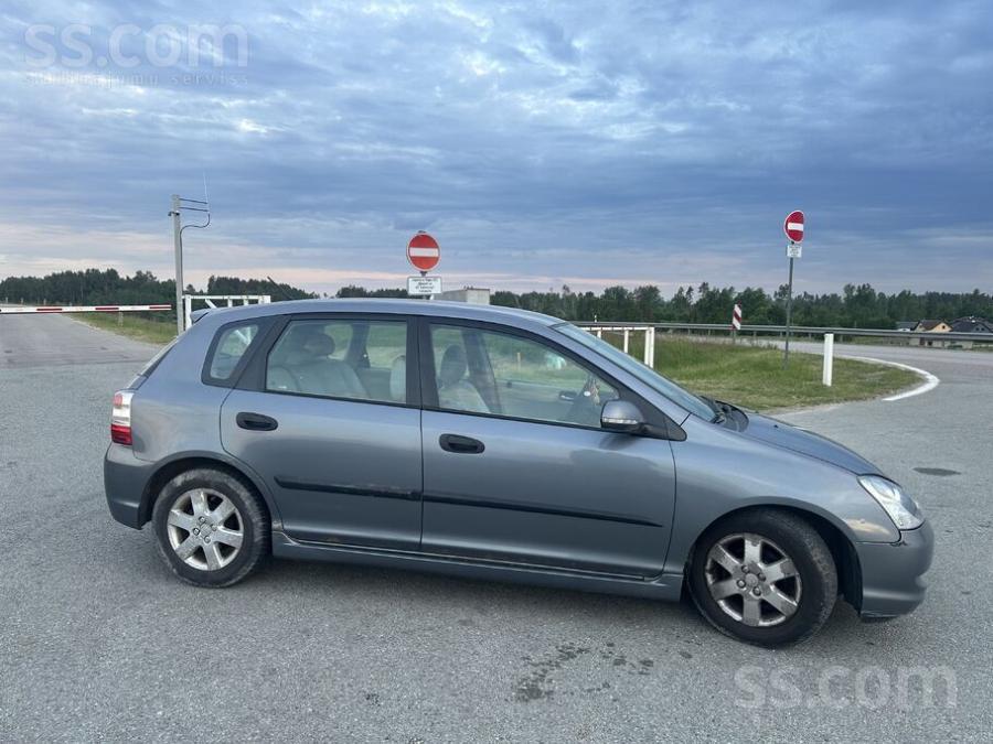 Blue Honda Civic 2005 in Riga, with an engine capacity of 1.60 L and mileage of 265 thousand km for 1200 €, photo 6 on AUTOMOTO.COM.LV
