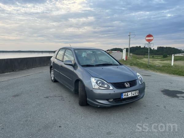Blue Honda Civic 2005 in Riga, with an engine capacity of 1.60 L and mileage of 265 thousand km for 1200 €, photo 6 on AUTOMOTO.COM.LV