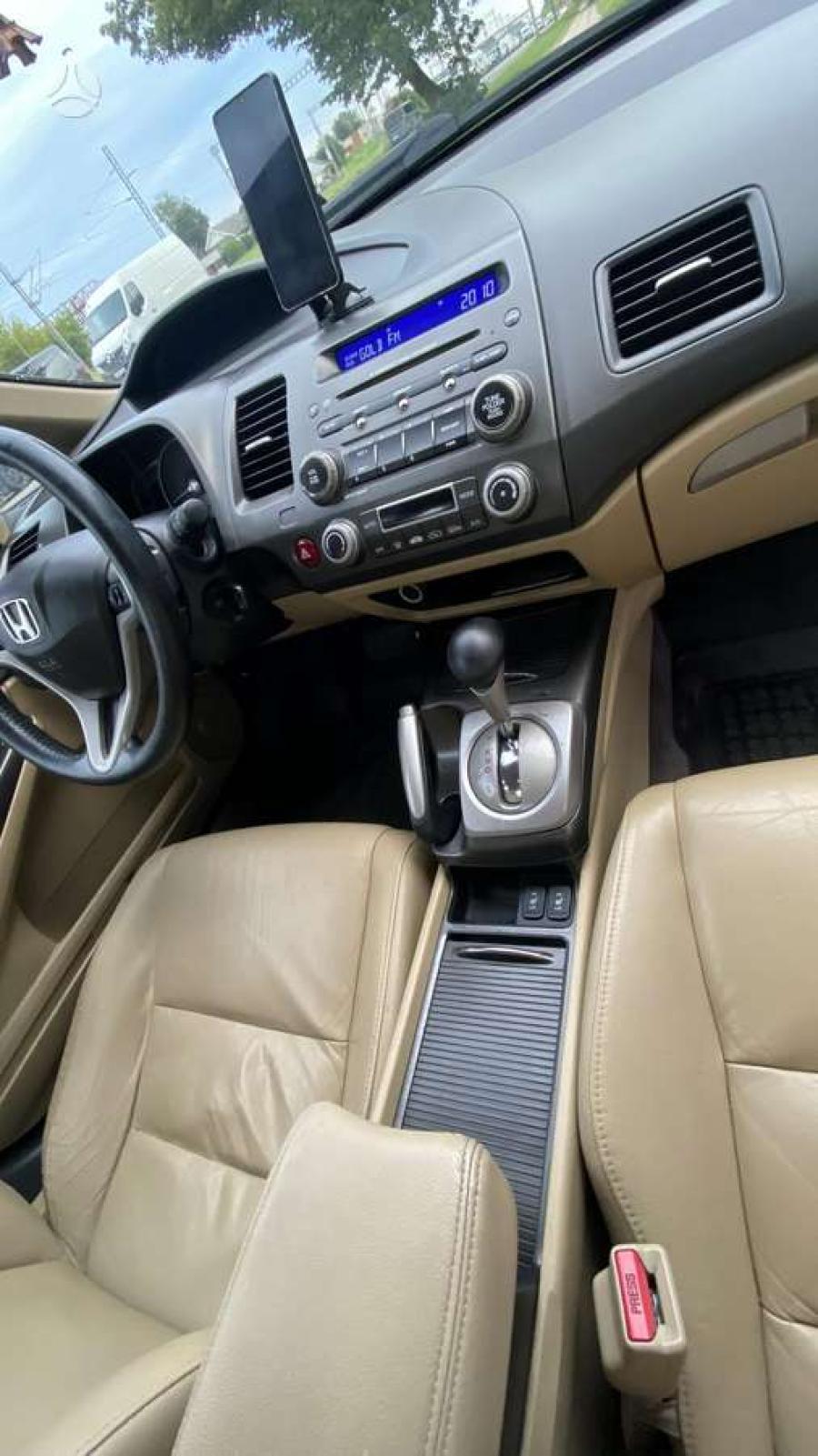 Blue Honda Civic 2006 in Vilnius, with an engine capacity of 1.30 L and mileage of 330 thousand km for 2900 €, photo 14 on AUTOMOTO.COM.LV