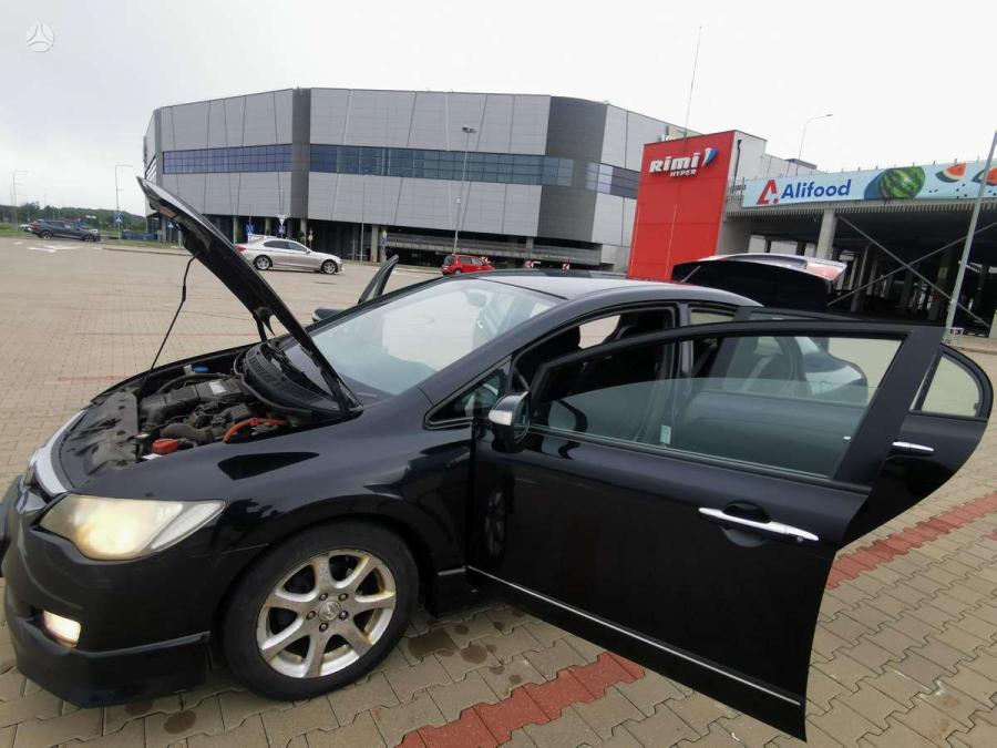 Blue Honda Civic 2009 in Vilnius, with an engine capacity of 1.34 L and mileage of 400 thousand km for 1350 €, photo 10 on AUTOMOTO.COM.LV