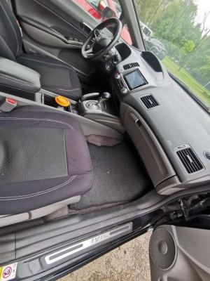 Blue Honda Civic 2009 in Vilnius, with an engine capacity of 1.34 L and mileage of 400 thousand km for 1350 €, photo 26 on AUTOMOTO.COM.LV