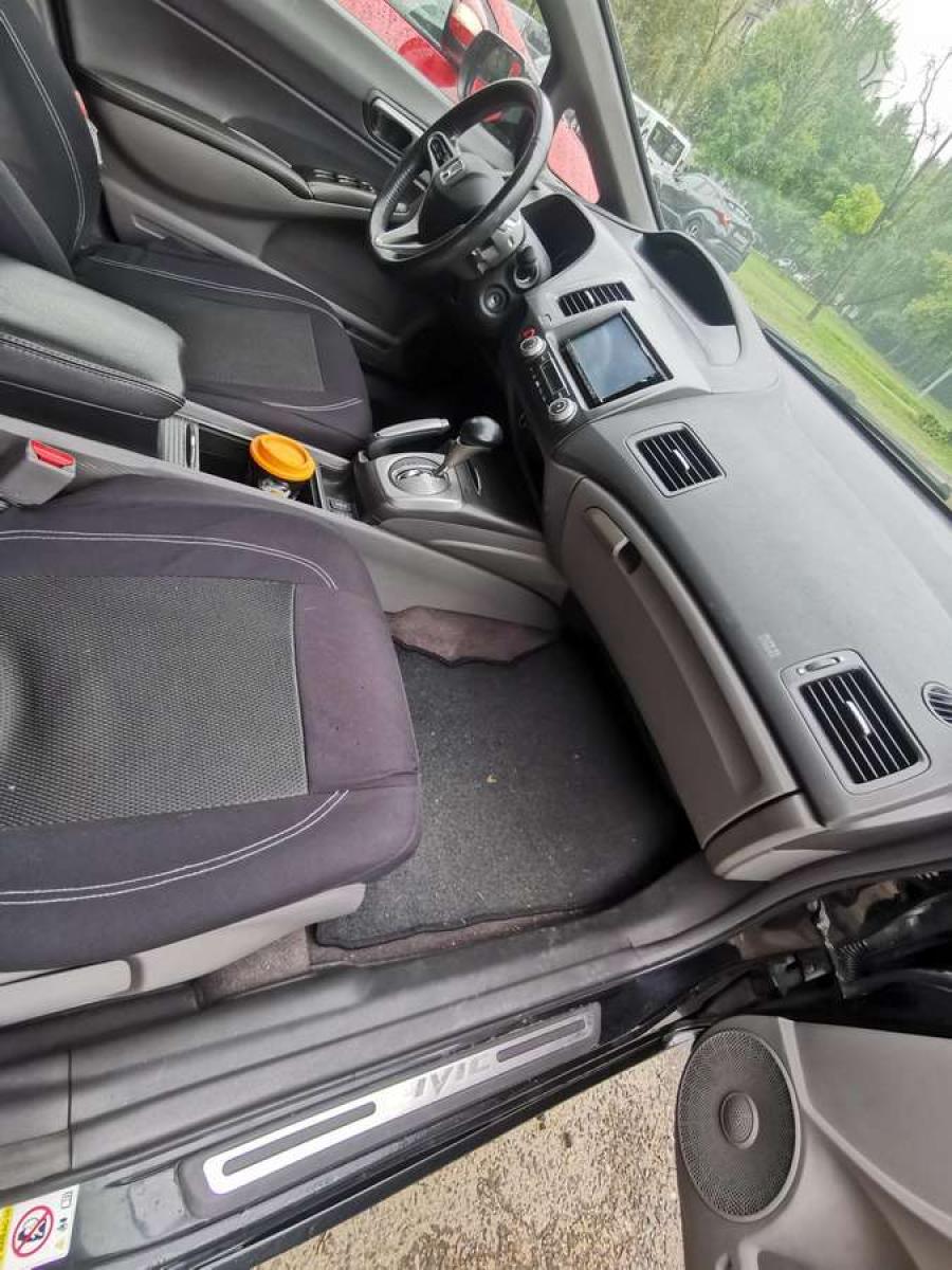 Blue Honda Civic 2009 in Vilnius, with an engine capacity of 1.34 L and mileage of 400 thousand km for 1350 €, photo 26 on AUTOMOTO.COM.LV