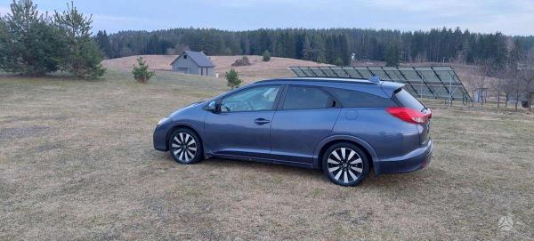 Blue Honda Civic 2015 in Trakai, with an engine capacity of 1.80 L and mileage of 151 thousand km for 5490 €, photo 1 on AUTOMOTO.COM.LV