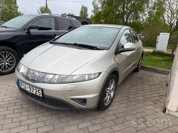 Brown Honda Civic 2006 in Riga, with an engine capacity of 1.40 L and mileage of 179 thousand km for 2000 €, photo 2 on AUTOMOTO.COM.LV