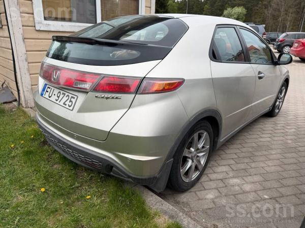 Brown Honda Civic 2006 in Riga, with an engine capacity of 1.40 L and mileage of 179 thousand km for 2000 €, photo 3 on AUTOMOTO.COM.LV