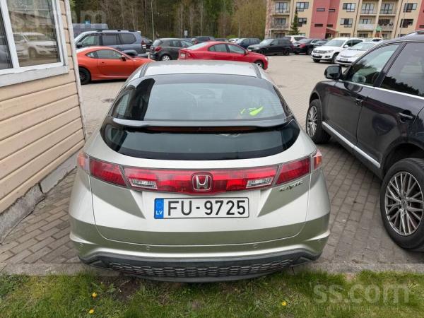 Brown Honda Civic 2006 in Riga, with an engine capacity of 1.40 L and mileage of 179 thousand km for 2000 €, photo 5 on AUTOMOTO.COM.LV