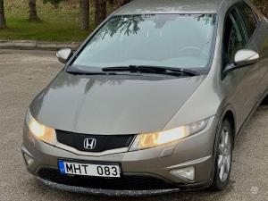 Brown Honda Civic 2007 in Vilnius, with an engine capacity of 1.80 L and mileage of 226 thousand km for 2250 €, photo 4 on AUTOMOTO.COM.LV