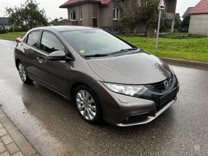 Brown Honda Civic 2013 in Ukmerge, with an engine capacity of 1.60 L and mileage of 228 thousand km for 4250 €, photo 3 on AUTOMOTO.COM.LV