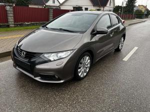 Brown Honda Civic 2013 in Ukmerge, with an engine capacity of 1.60 L and mileage of 228 thousand km for 4250 €, photo 4 on AUTOMOTO.COM.LV