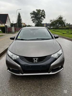 Brown Honda Civic 2013 in Ukmerge, with an engine capacity of 1.60 L and mileage of 228 thousand km for 4250 €, photo 13 on AUTOMOTO.COM.LV