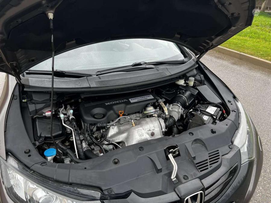 Brown Honda Civic 2013 in Ukmerge, with an engine capacity of 1.60 L and mileage of 228 thousand km for 4250 €, photo 31 on AUTOMOTO.COM.LV