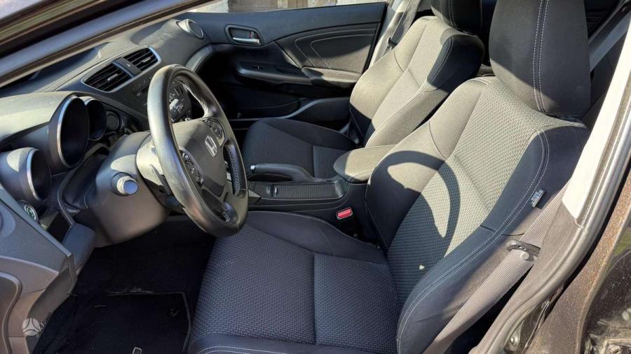 Brown Honda Civic 2015 in Vilnius, with an engine capacity of 1.80 L and mileage of 165 thousand km for 7850 €, photo 7 on AUTOMOTO.COM.LV