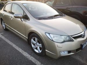 Brown Honda Civic 2007 in Vilnius, with an engine capacity of 1.80 L and mileage of 178 thousand km for 1550 €, photo  on AUTOMOTO.COM.LV