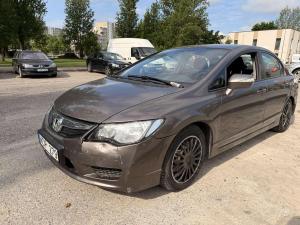Brown Honda Civic 2010 in Vilnius, with an engine capacity of 1.80 L and mileage of 291 thousand km for 1499 €, photo 10 on AUTOMOTO.COM.LV