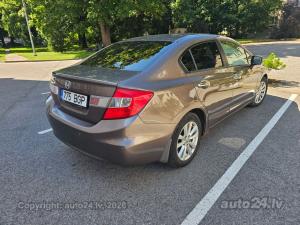 Brown Honda Civic 2012 in Tartu, with an engine capacity of 1.80 L and mileage of 191 thousand km for 4500 €, photo 3 on AUTOMOTO.COM.LV