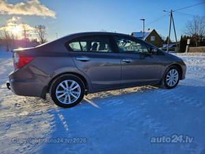 Brown Honda Civic 2013 in Rakvere, with an engine capacity of 1.80 L and mileage of 181 thousand km for 5900 €, photo 12 on AUTOMOTO.COM.LV