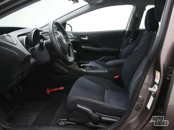 Brown Honda Civic 2014 in Vilnius, with an engine capacity of 1.60 L and mileage of 91 thousand km for 7799 €, photo 4 on AUTOMOTO.COM.LV