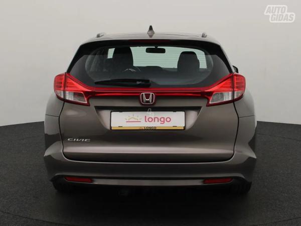 Brown Honda Civic 2014 in Vilnius, with an engine capacity of 1.60 L and mileage of 91 thousand km for 7799 €, photo 5 on AUTOMOTO.COM.LV